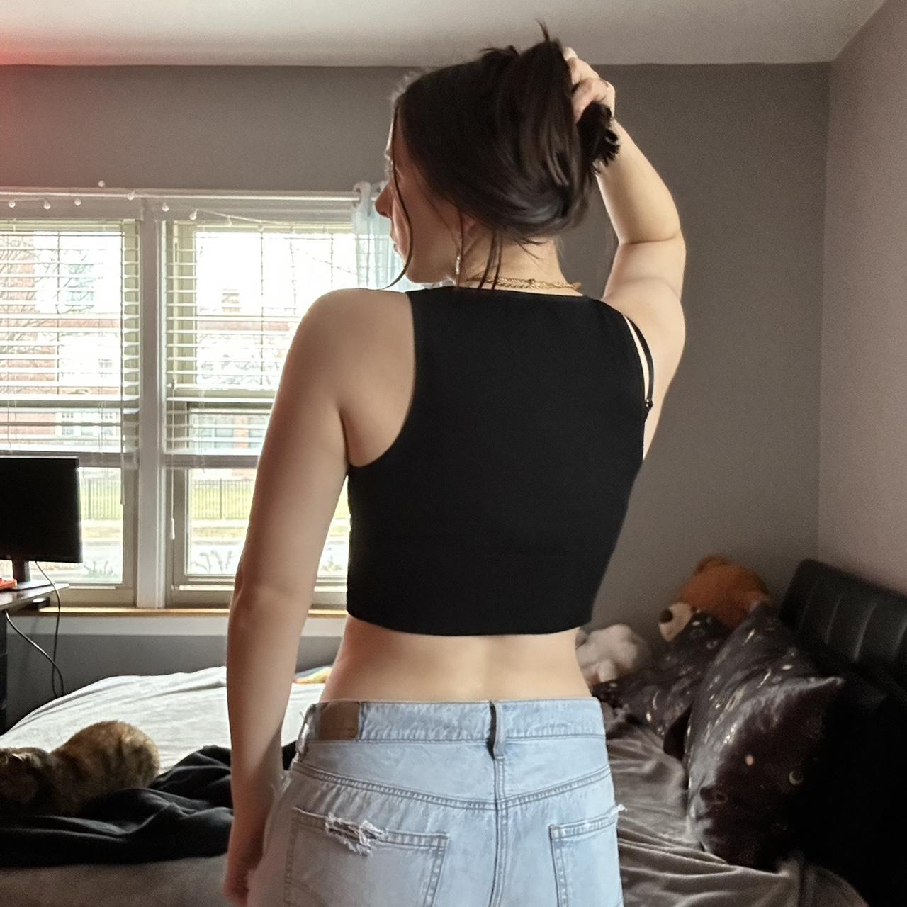 Basic black cropped tank top. Good closet staple... - Depop