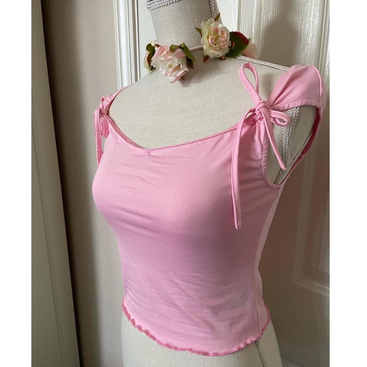 Pink top 💗🎀🪷 This flattering top has a stretchy... - Depop