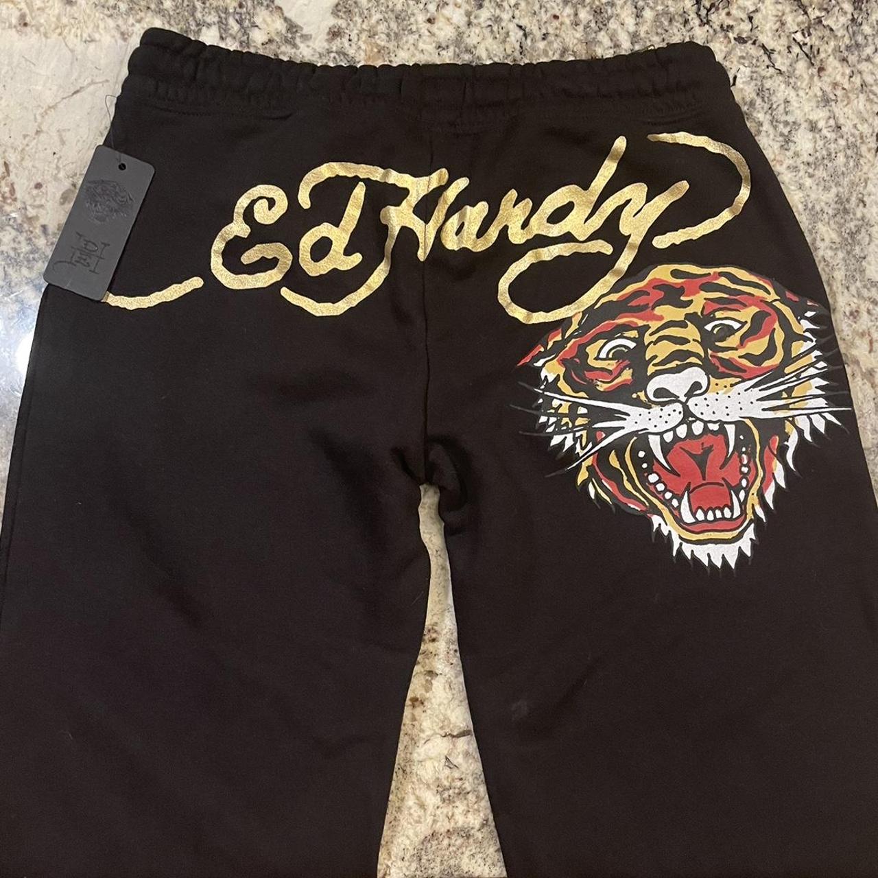 Ed Hardy Black and Gold Spellout... - Depop