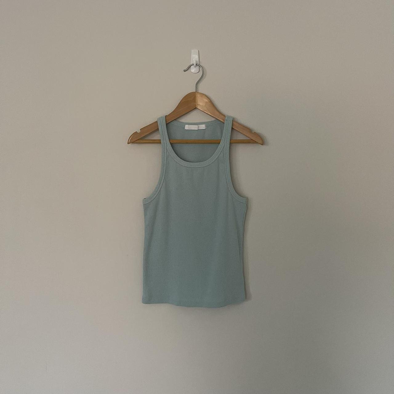 light blue tank top stretchy from Supre label size:... - Depop