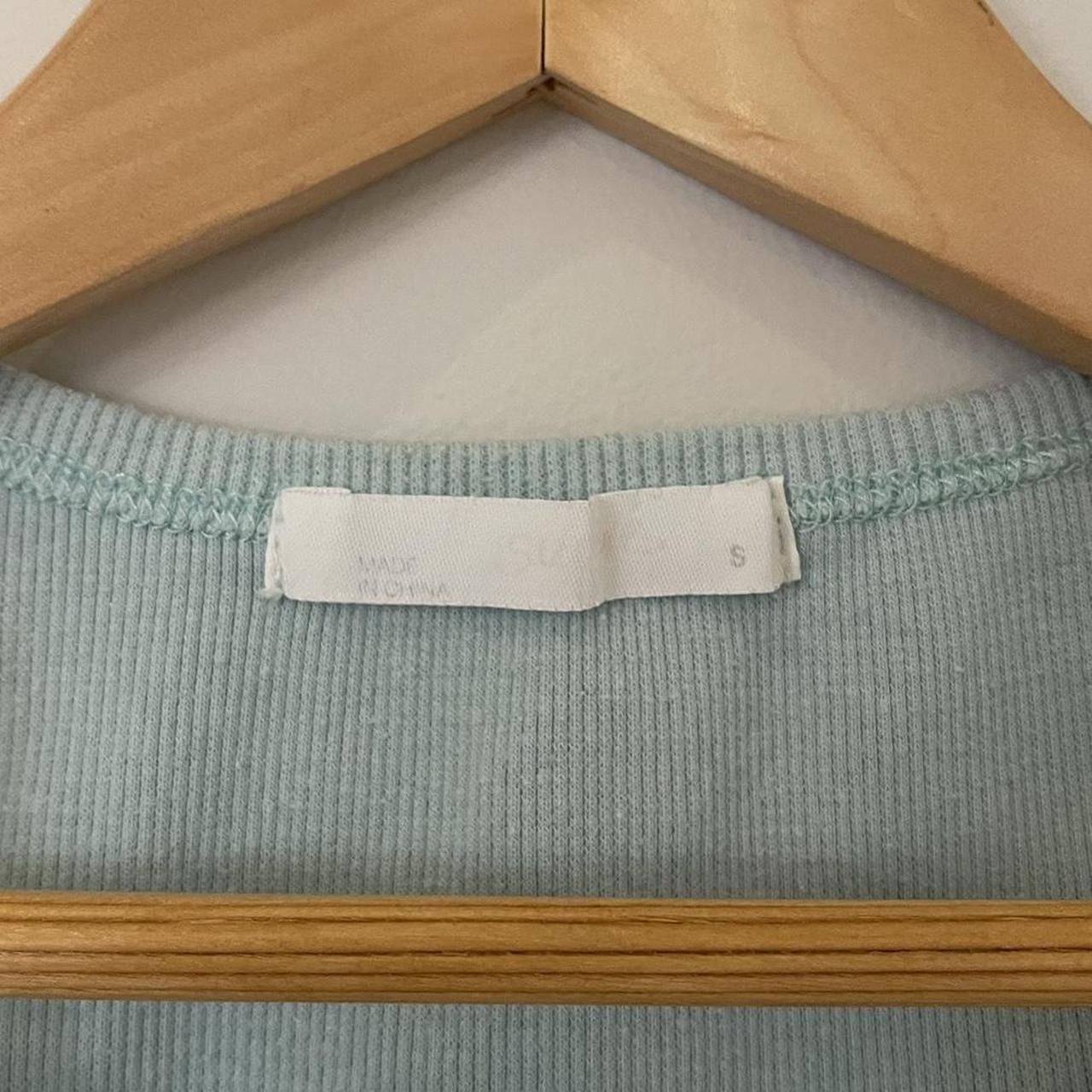 light blue tank top stretchy from Supre label size:... - Depop