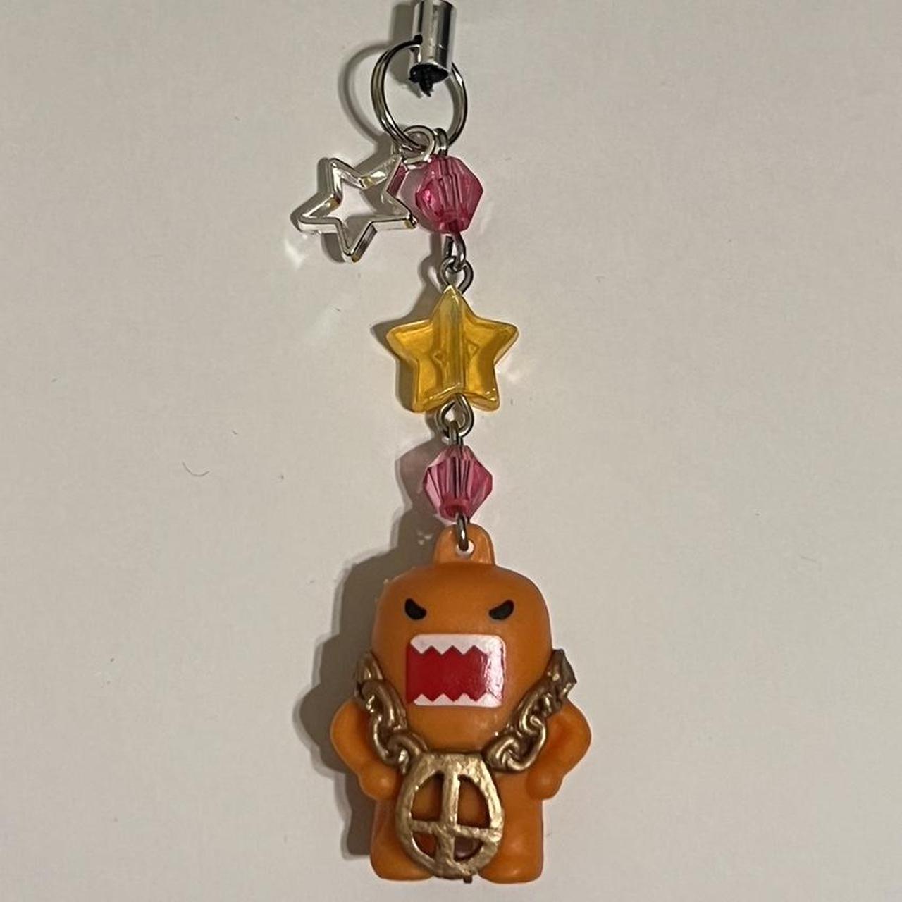Domo W/ Chain Phone charm! Prices are based off... - Depop