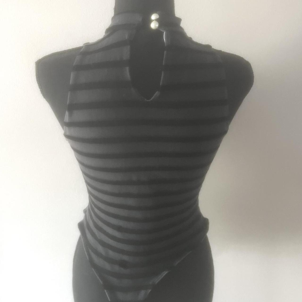 Black Contempo Casuals sheer minor hole 🕳️ on the... | Depop