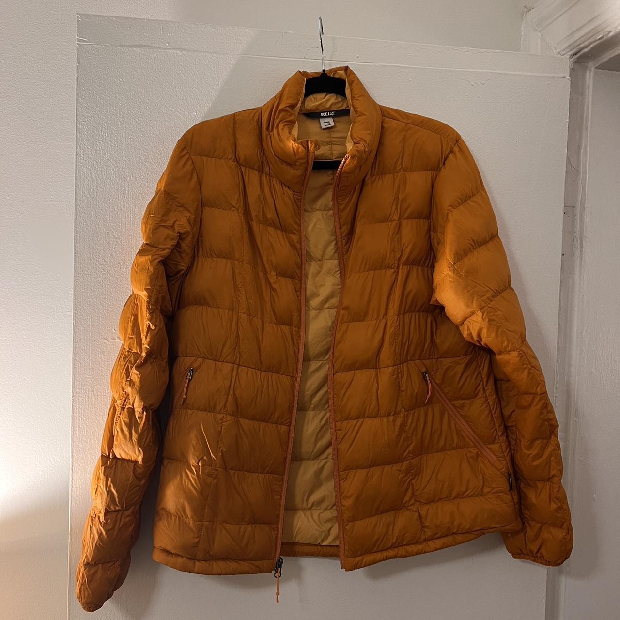 Burnt orange down puffer jacket with zipper pockets... - Depop