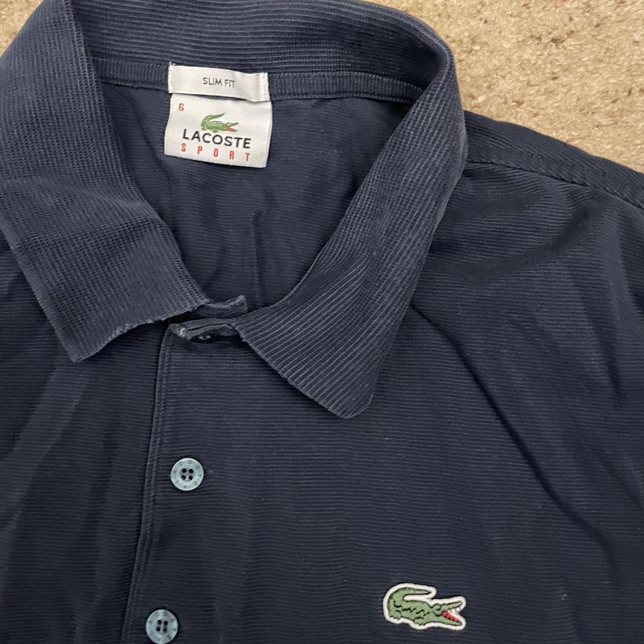 Lacoste navy polo size small - Depop