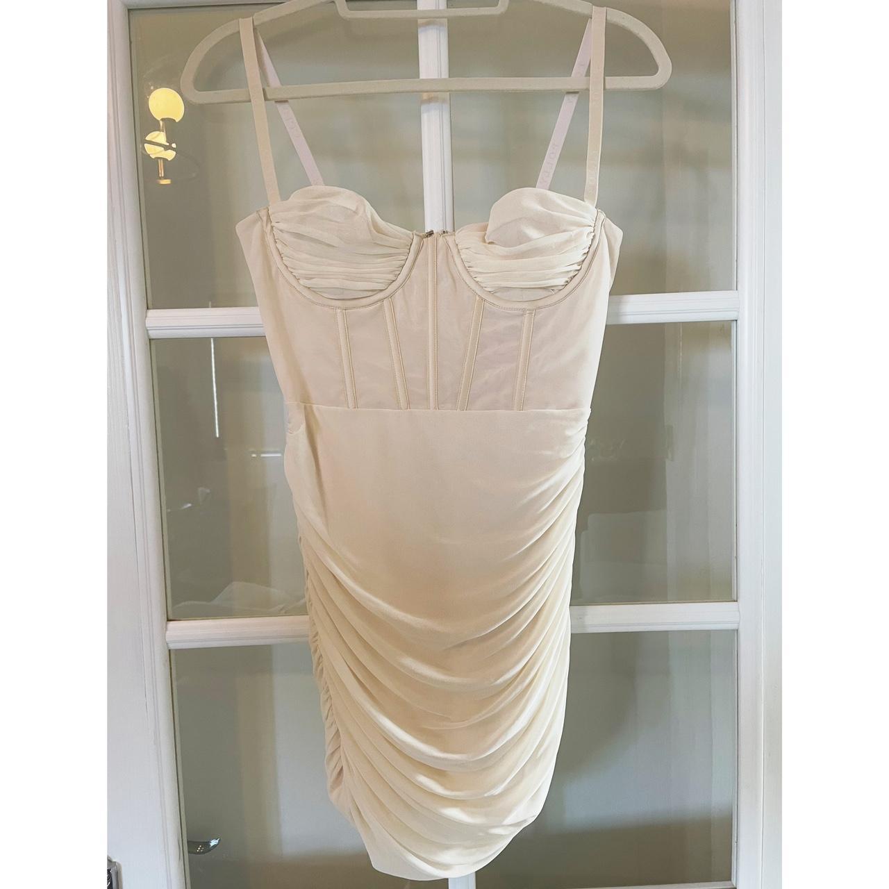 Stunning cream corset style mini dress from Oh... - Depop
