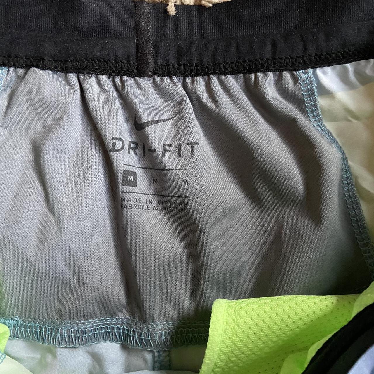 Medium dri fit multi colored Nike shorts - worn a... - Depop