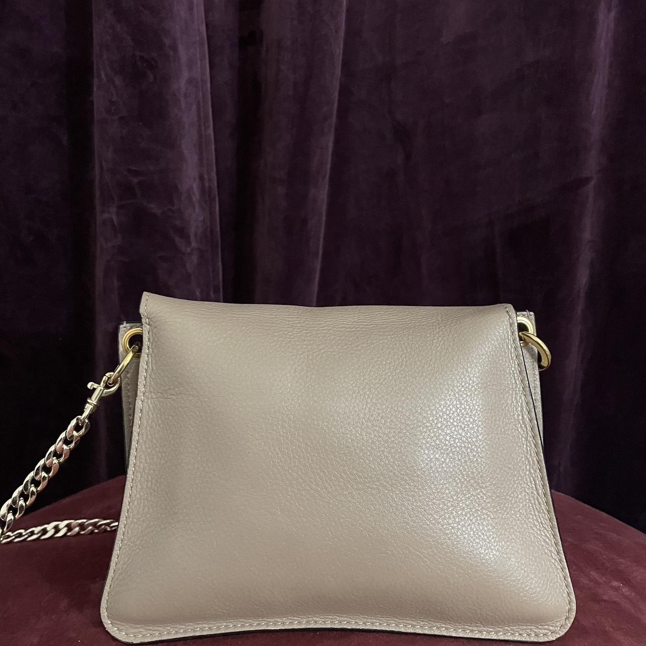 J W Anderson piercing bag. 15 x 21 cm. Mark below... - Depop