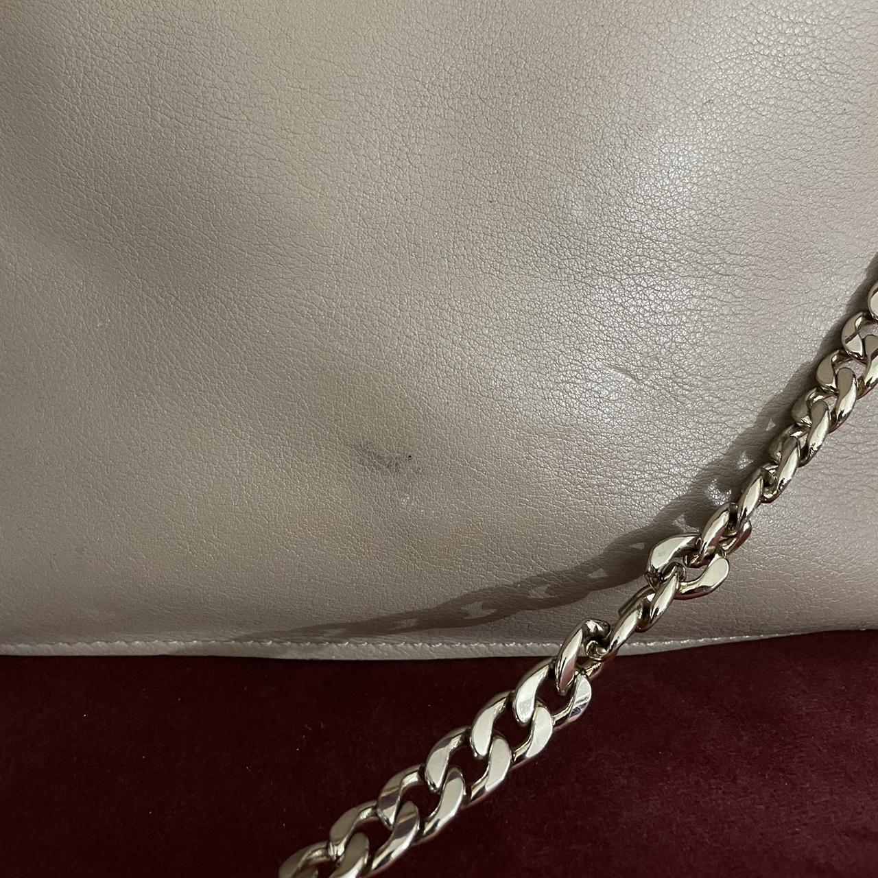 J W Anderson piercing bag. 15 x 21 cm. Mark below... - Depop
