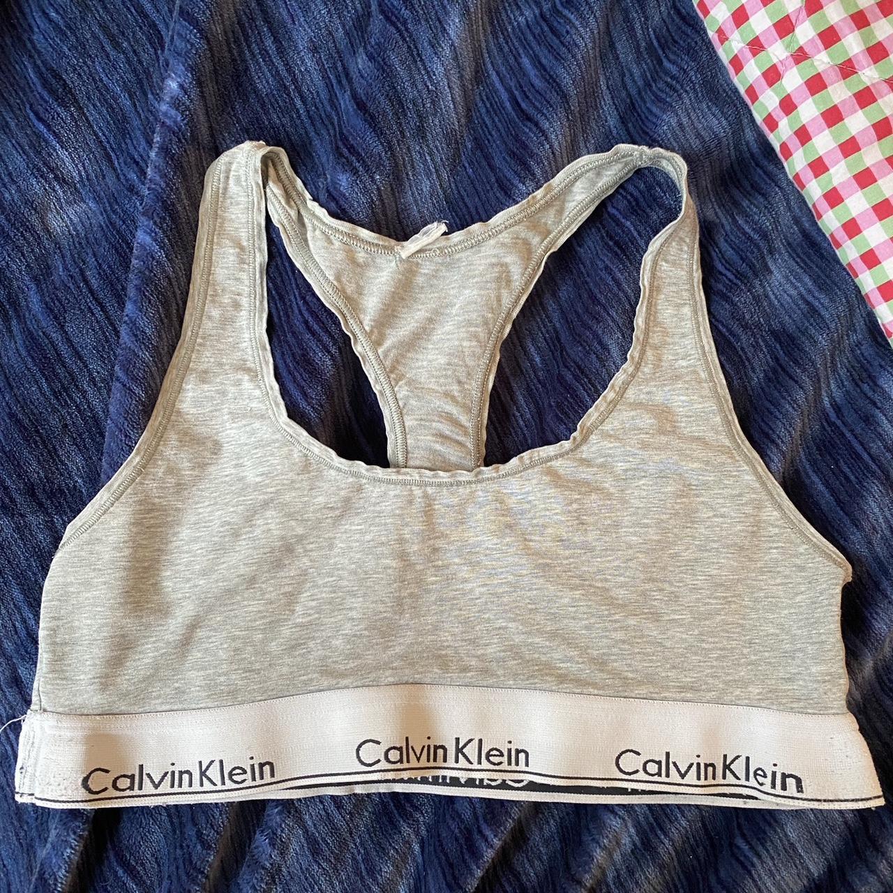 Calvin Klein grey bralet Size medium Worn a lot so... - Depop