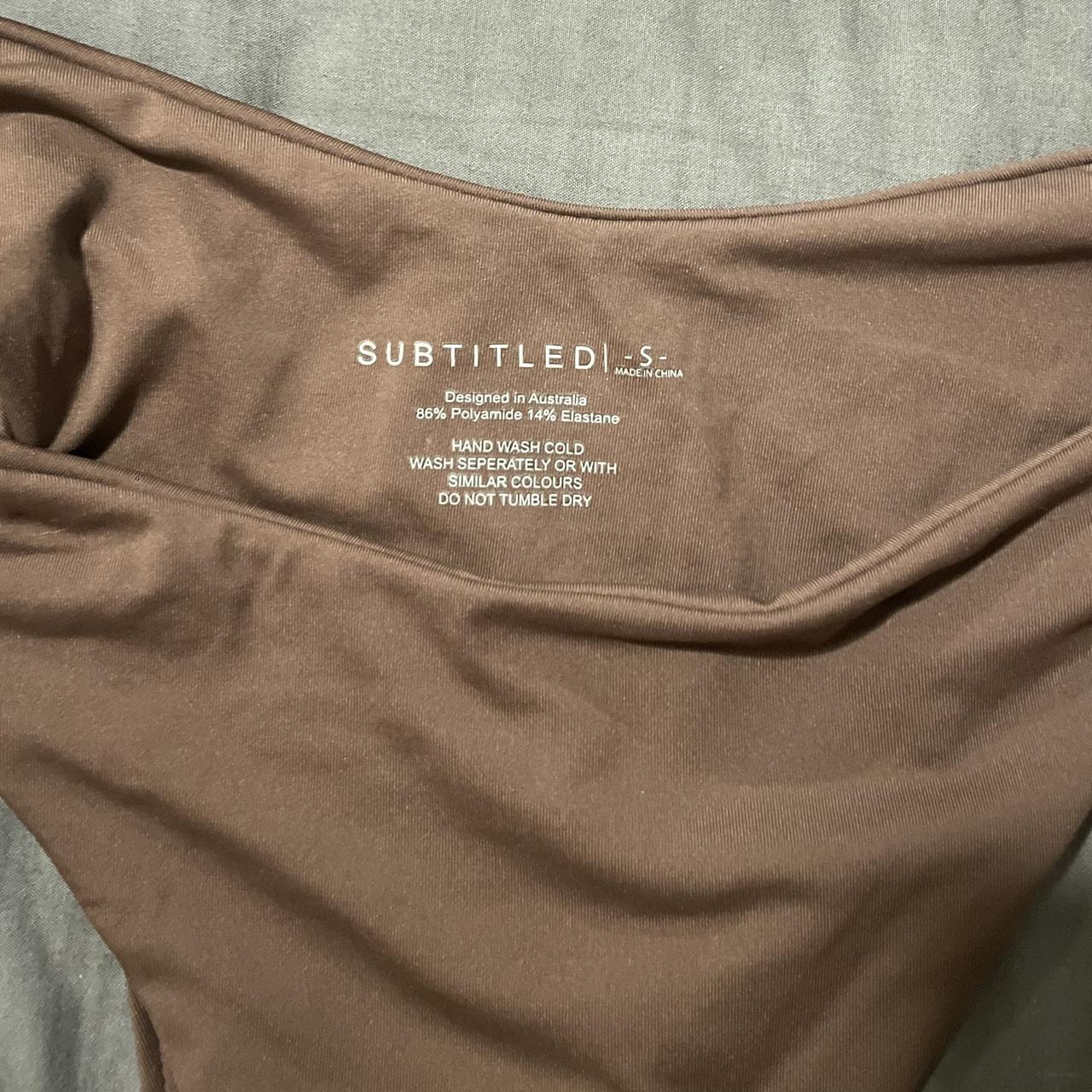 Subtitled brown bikini set Top and bottom are both... - Depop