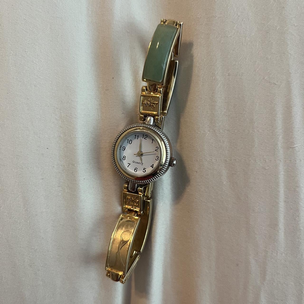 beautiful watch with stones one is missing but not... - Depop