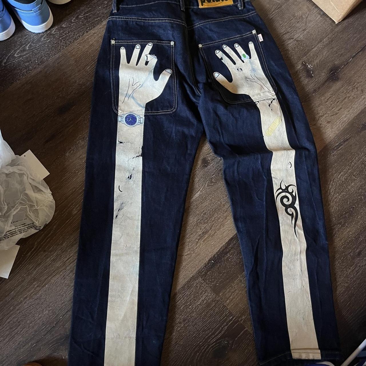 imran potato extendo leg jeans the graphic is... - Depop