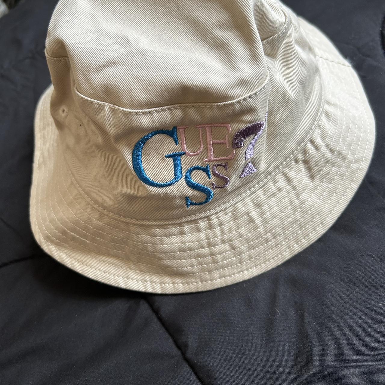 Tan Guess bucket hat - Depop
