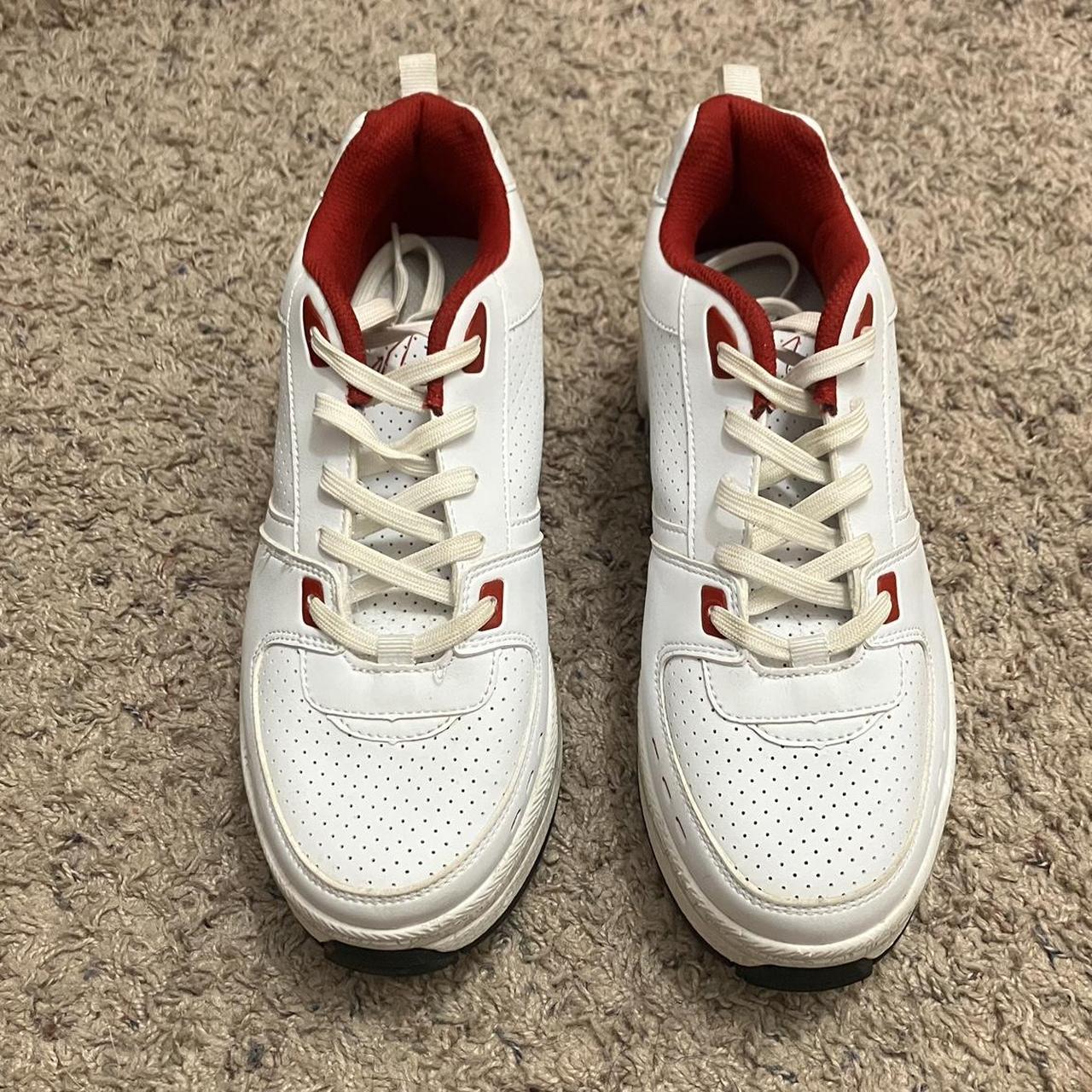 white and red pop-out roller skate shoes marked as... - Depop