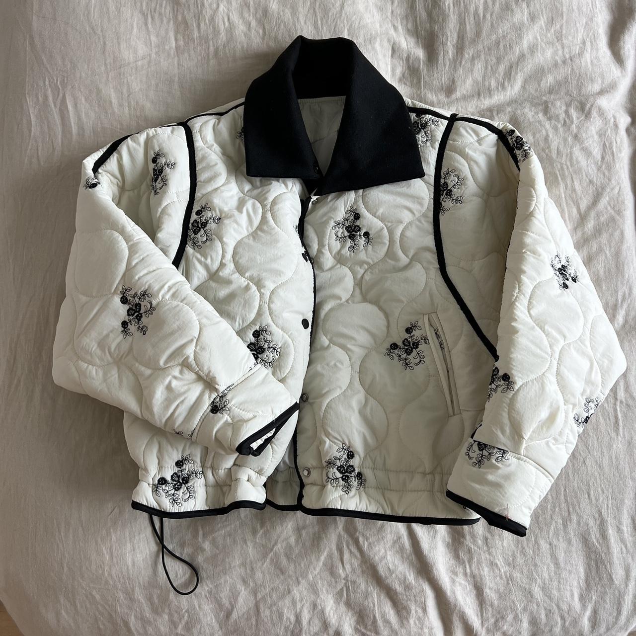 ON HOLD- Black floral puffer jacket with in size M... - Depop