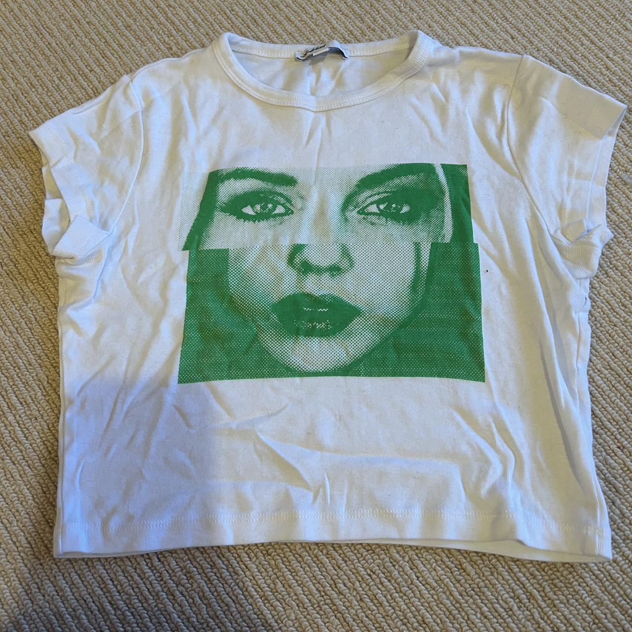 White subdued top with green print of face, so cute... - Depop