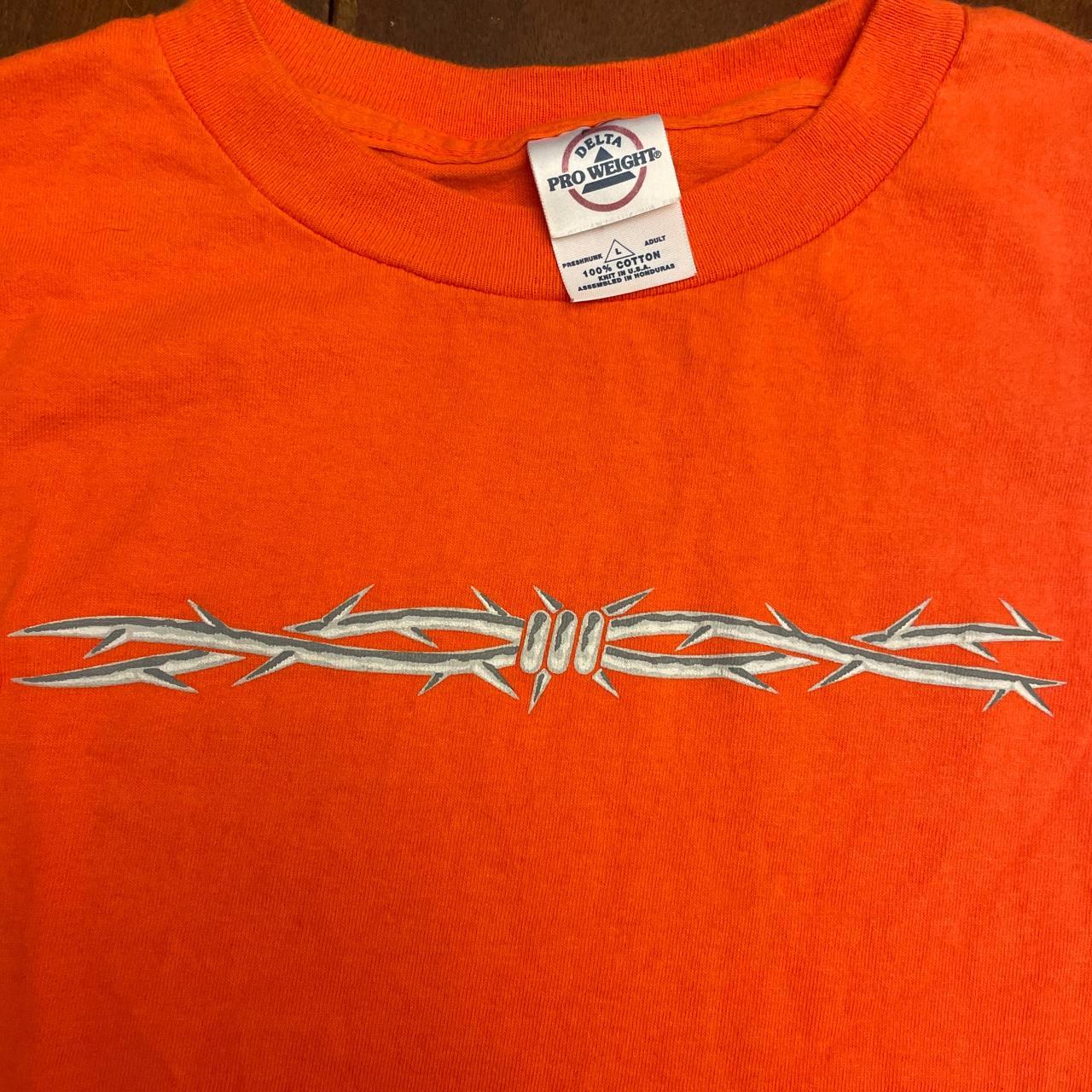 Cool orange shirt with barbed wire I got this... - Depop