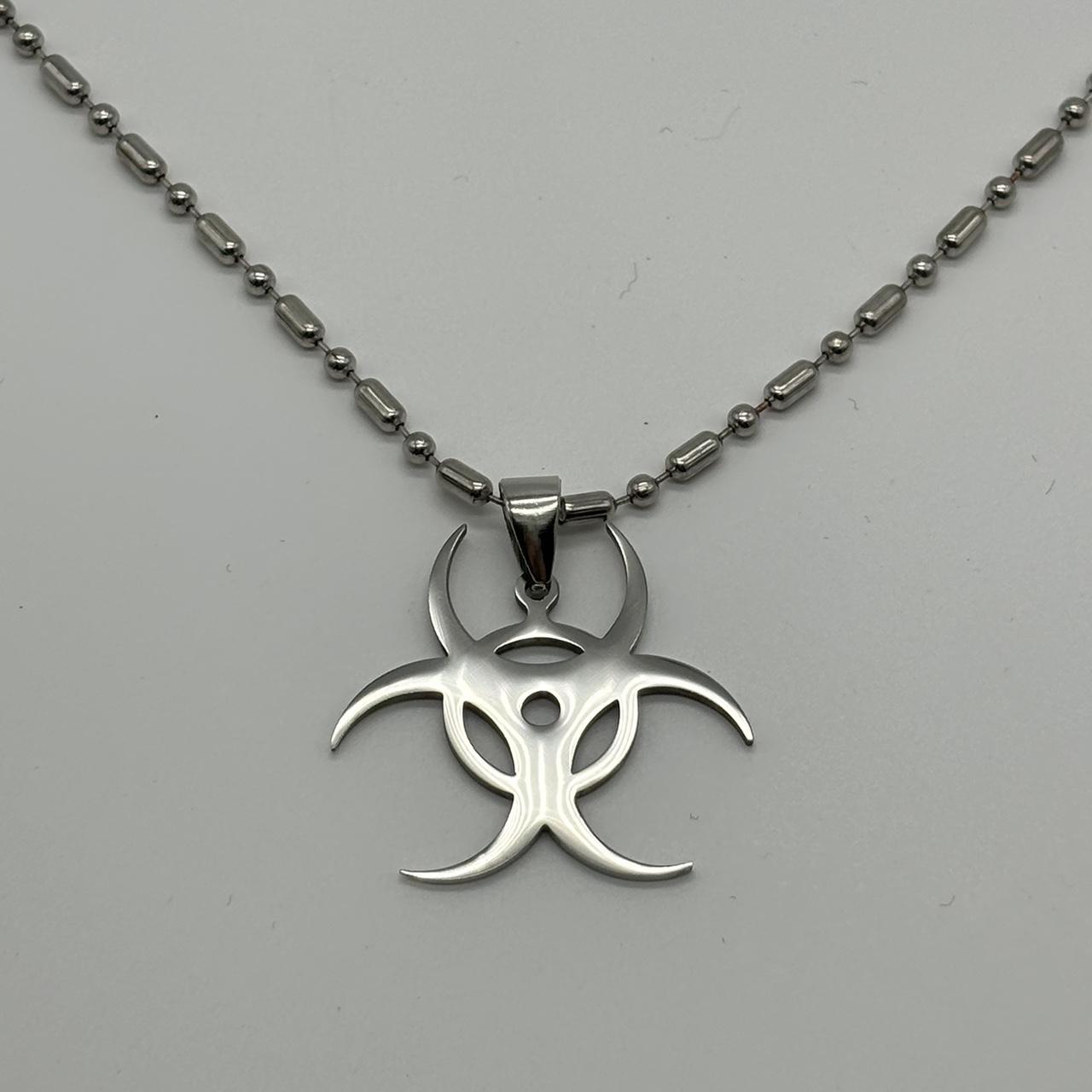 0255 - Silver Biohazard Necklace FREE SHIPPING WHEN... | Depop
