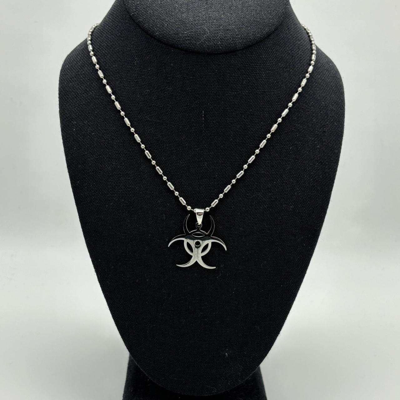0255 - Silver Biohazard Necklace FREE SHIPPING WHEN... | Depop
