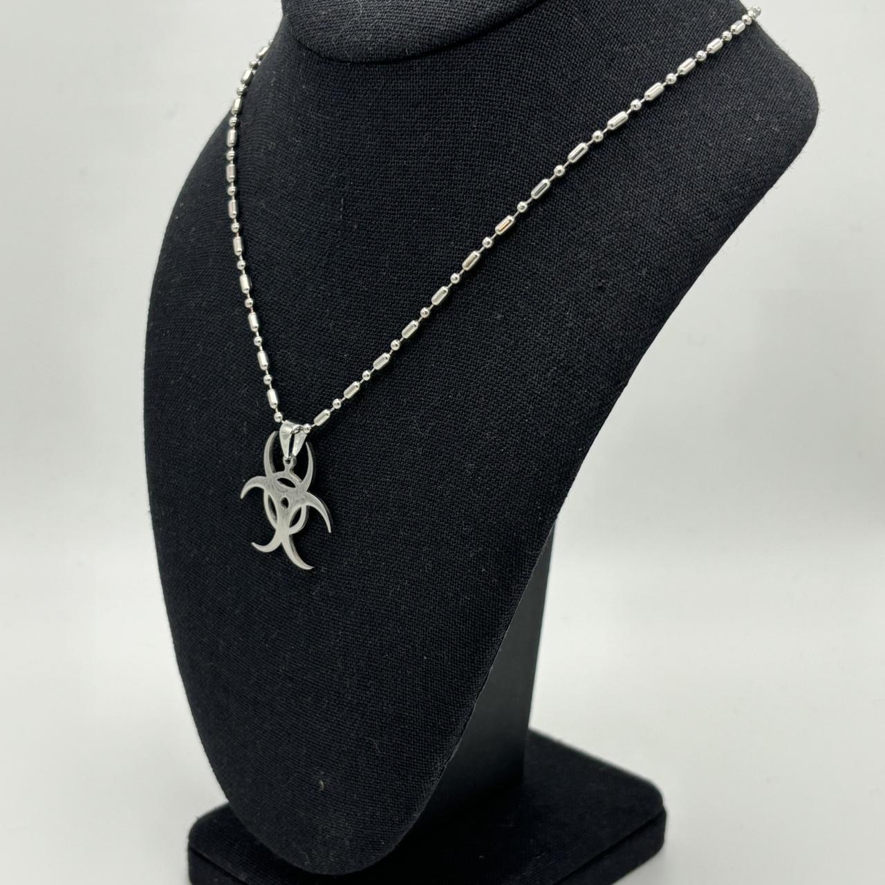 0255 - Silver Biohazard Necklace Stainless steel... - Depop