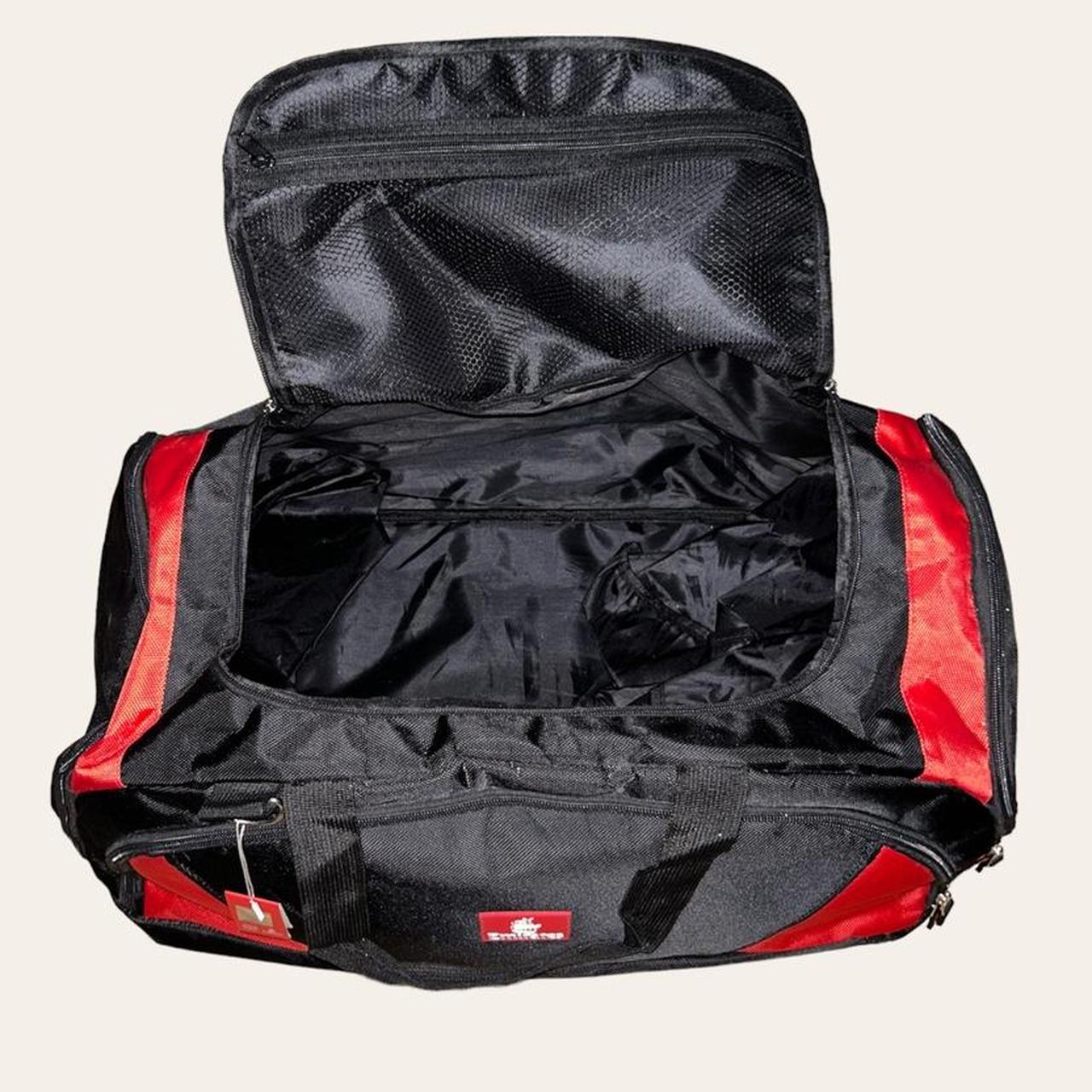 Red & black Emirates luggage/travel bag... - Depop