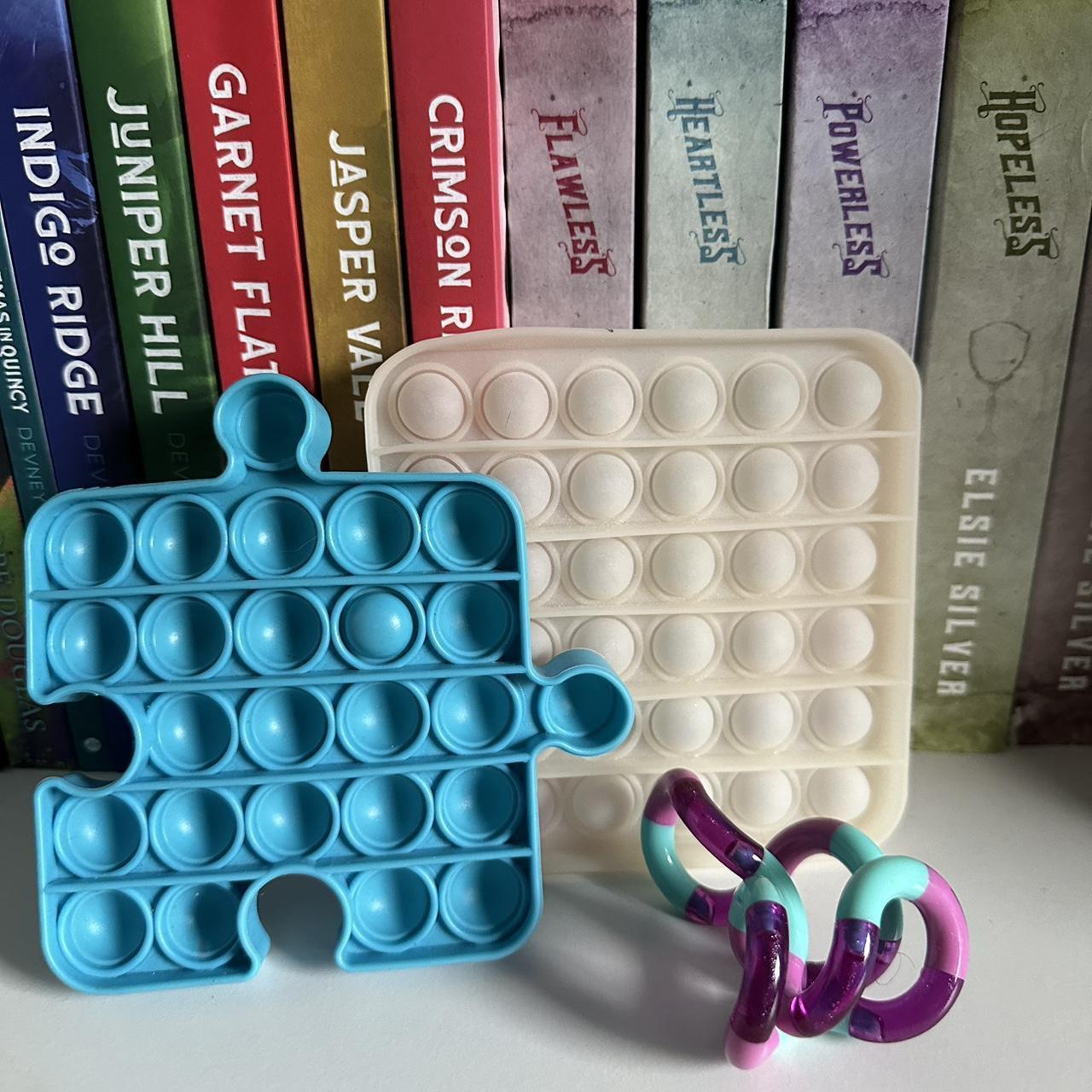 Random Fidget toys one puzzle pop it and one glow in... - Depop