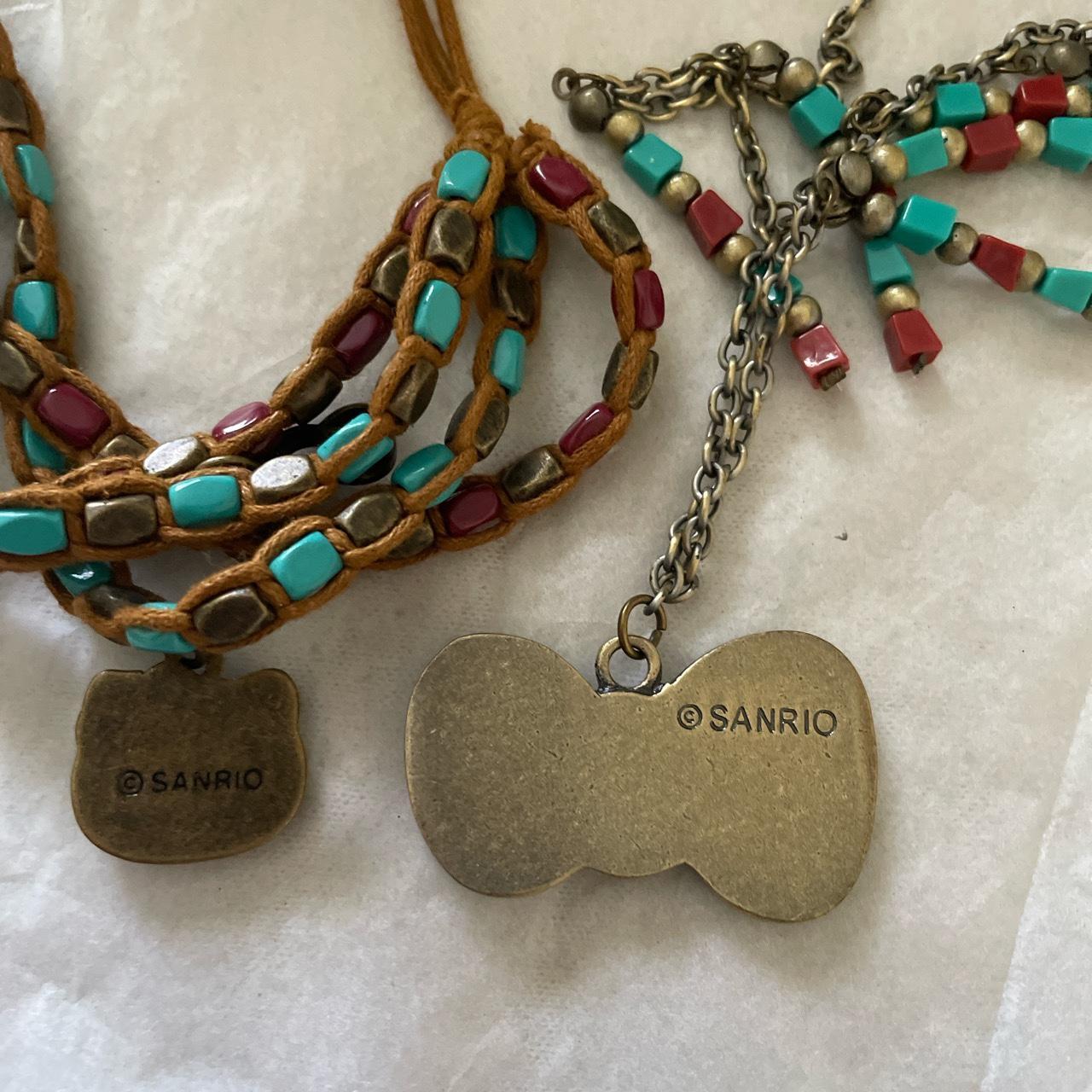 Western style turquoise Hello Kitty necklace and... - Depop