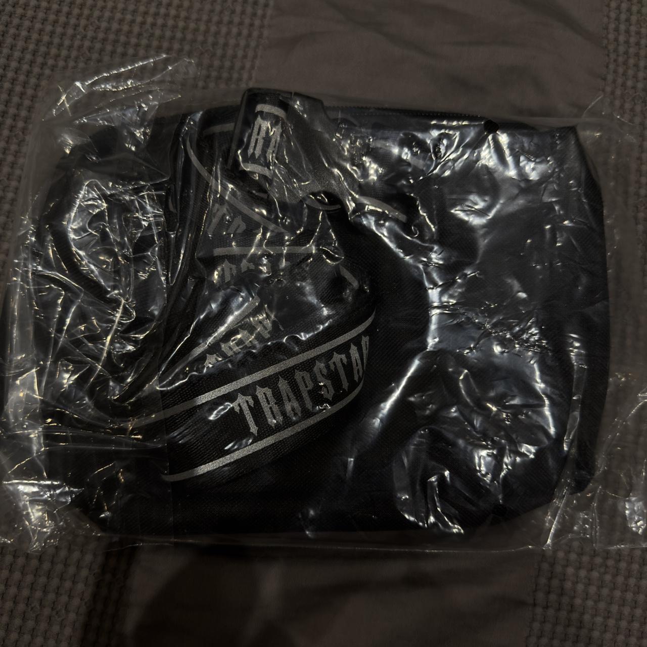 Trapstar Men's Black and Silver Bag | Depop