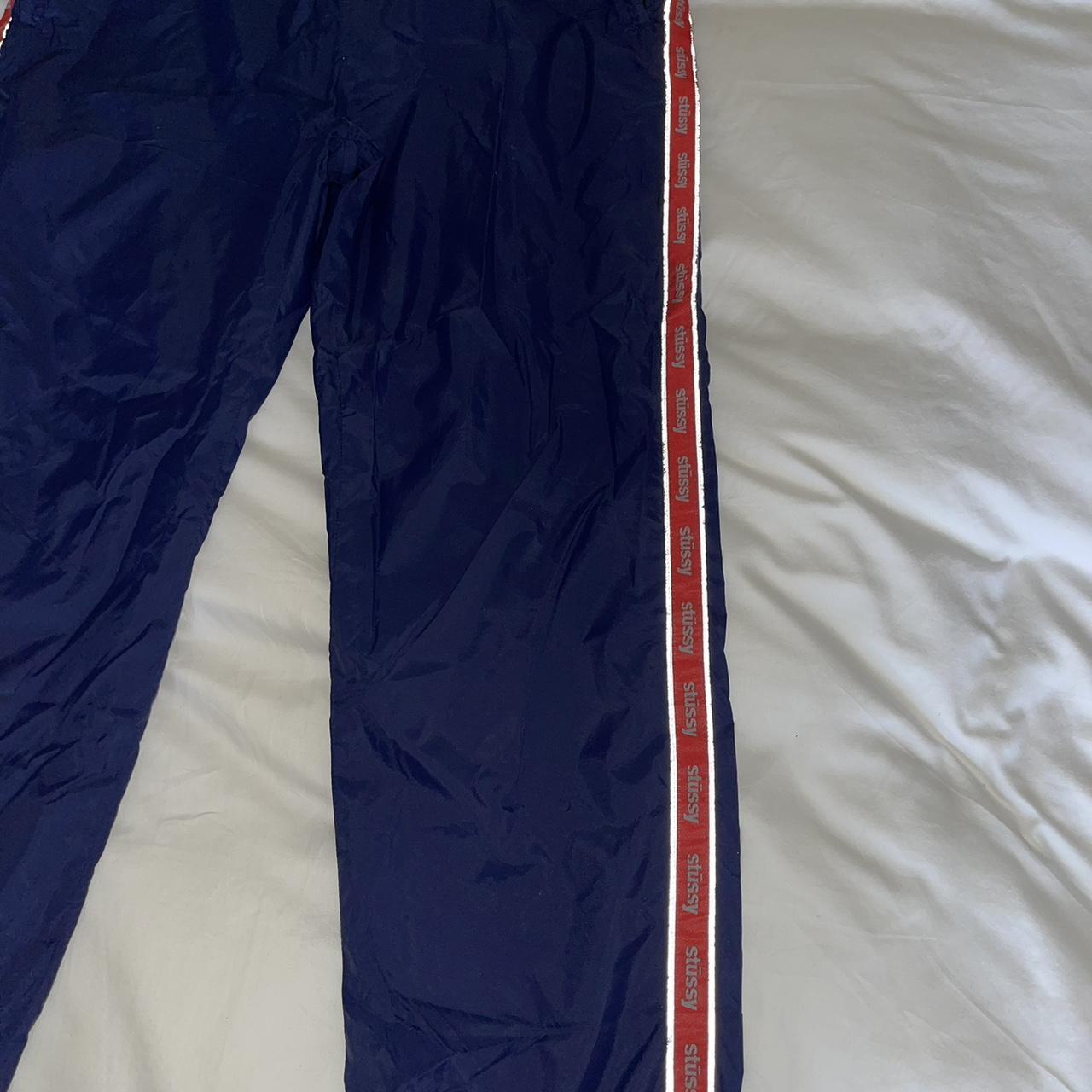 Reflective stussy tracksuit bottoms. Great... - Depop
