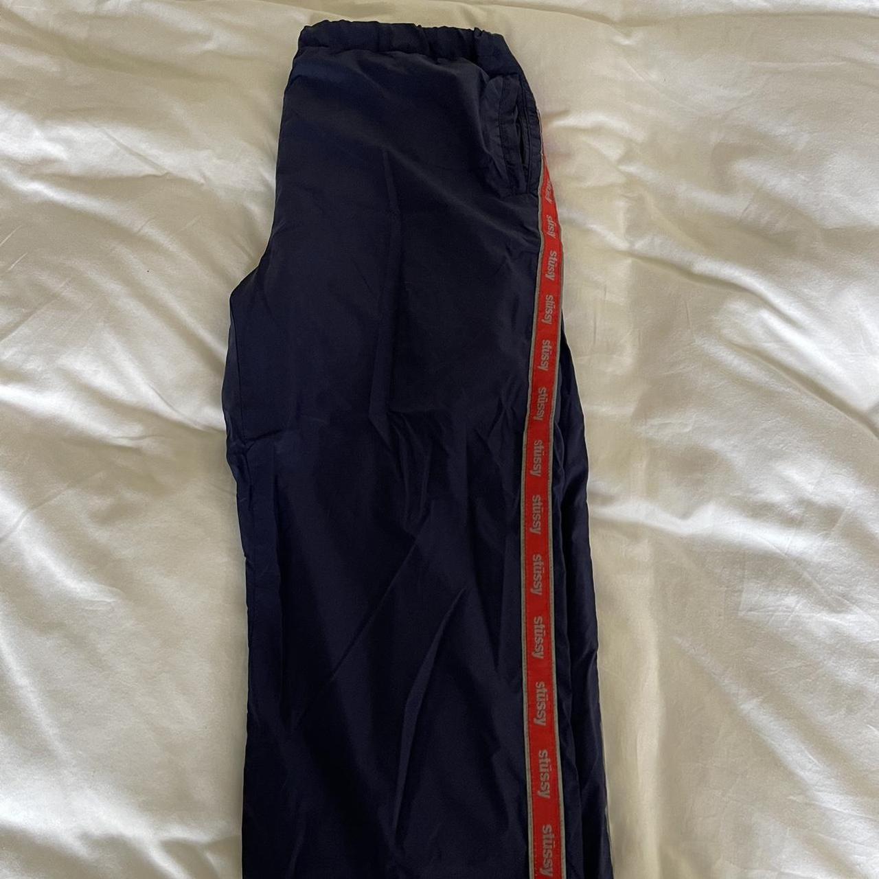 Reflective stussy tracksuit bottoms. Great... - Depop