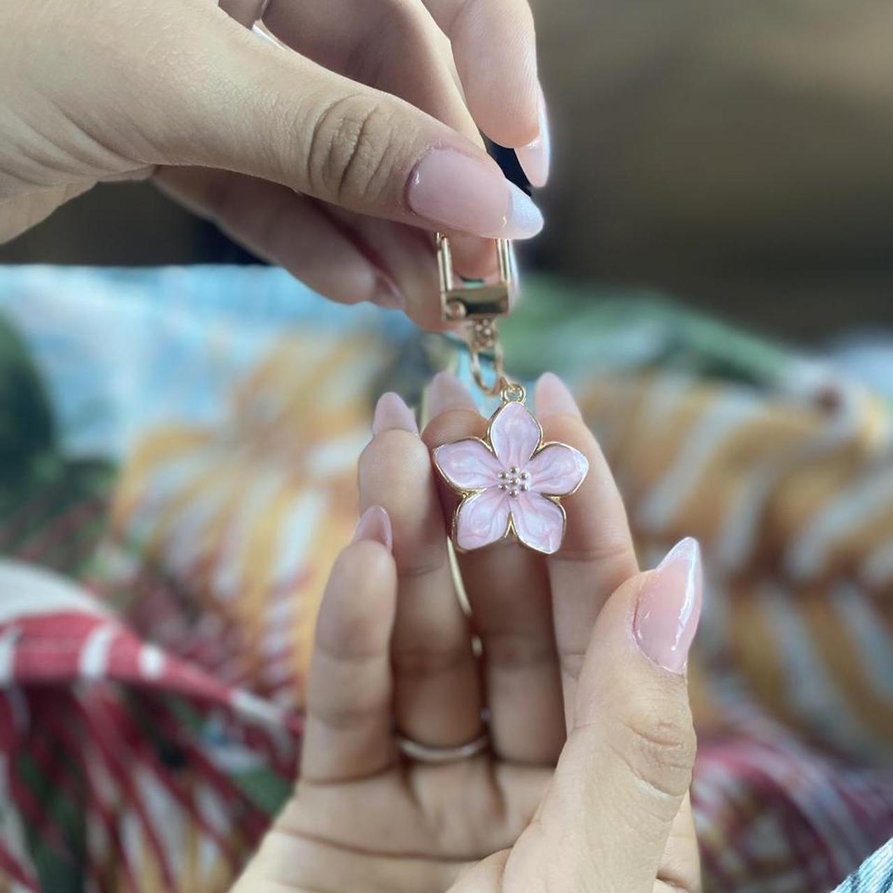 Pink flower keychain with gold accents #accessorize - Depop