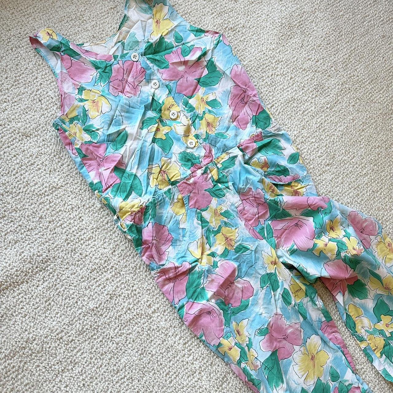 Cute and fun jumpsuit. It fits a little lose for me... - Depop