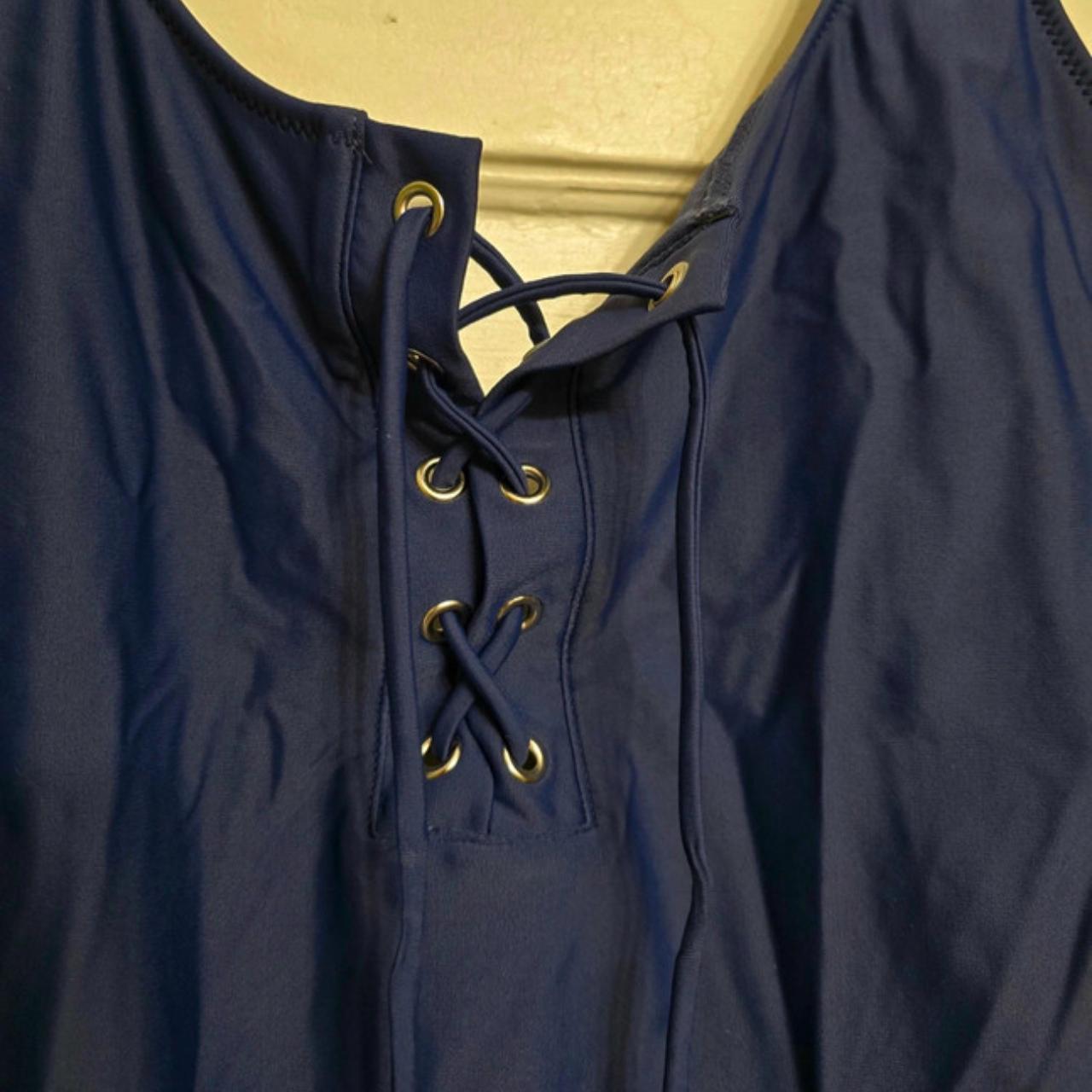 Navy bathing suit with laced bust and low-cut back.... - Depop