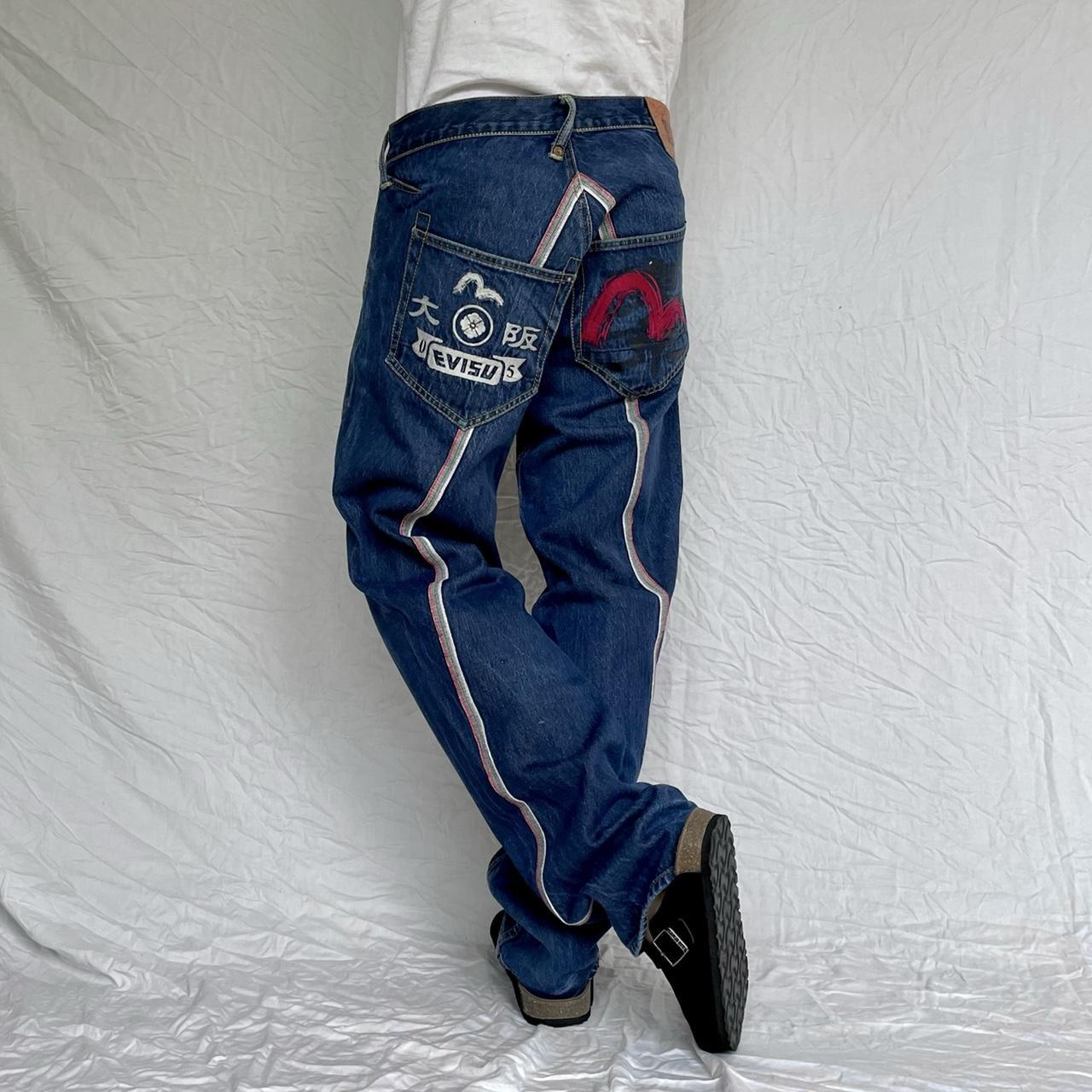 Evisu Jeans dark wash denim with unique inverted... - Depop