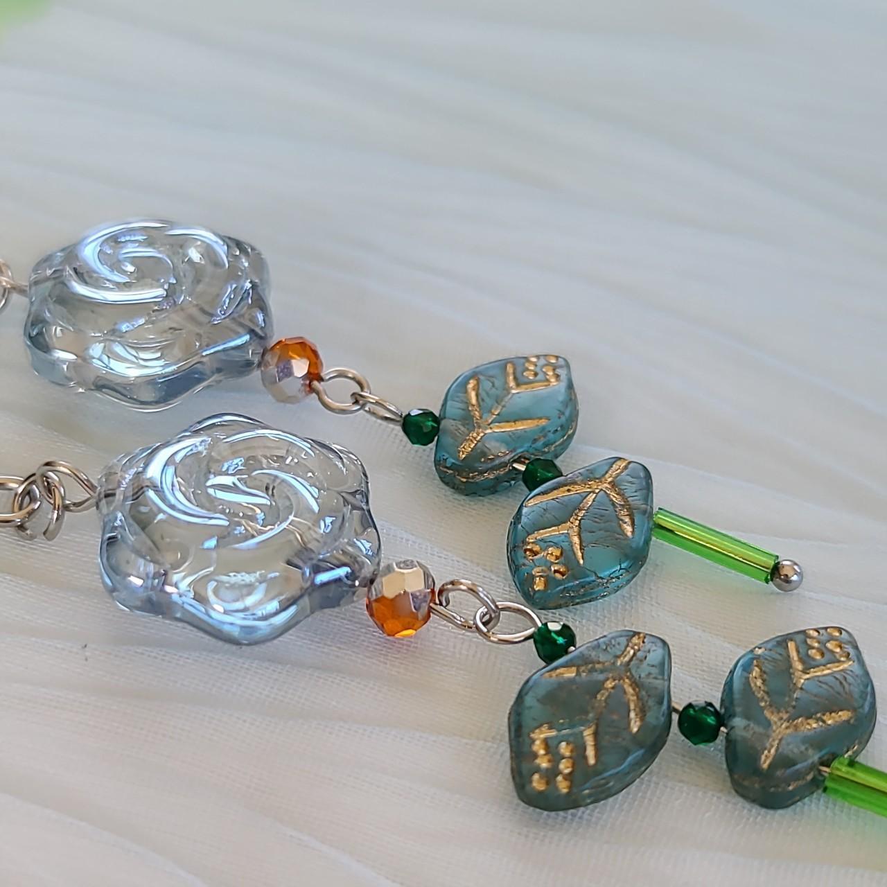 Handmade glass flower branch earrings -Blue glass... - Depop Handmade glass flower branch earrings -Blue glass... - Depop