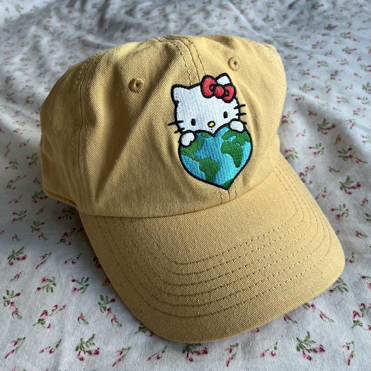 super cute yellow/beige hello kitty cap! never... - Depop