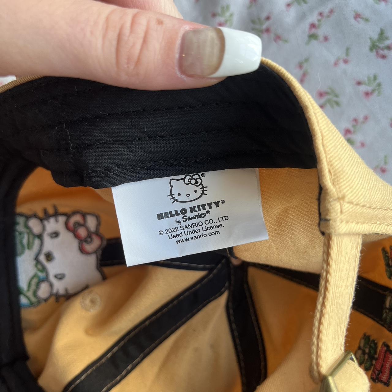 super cute yellow/beige hello kitty cap! never... - Depop