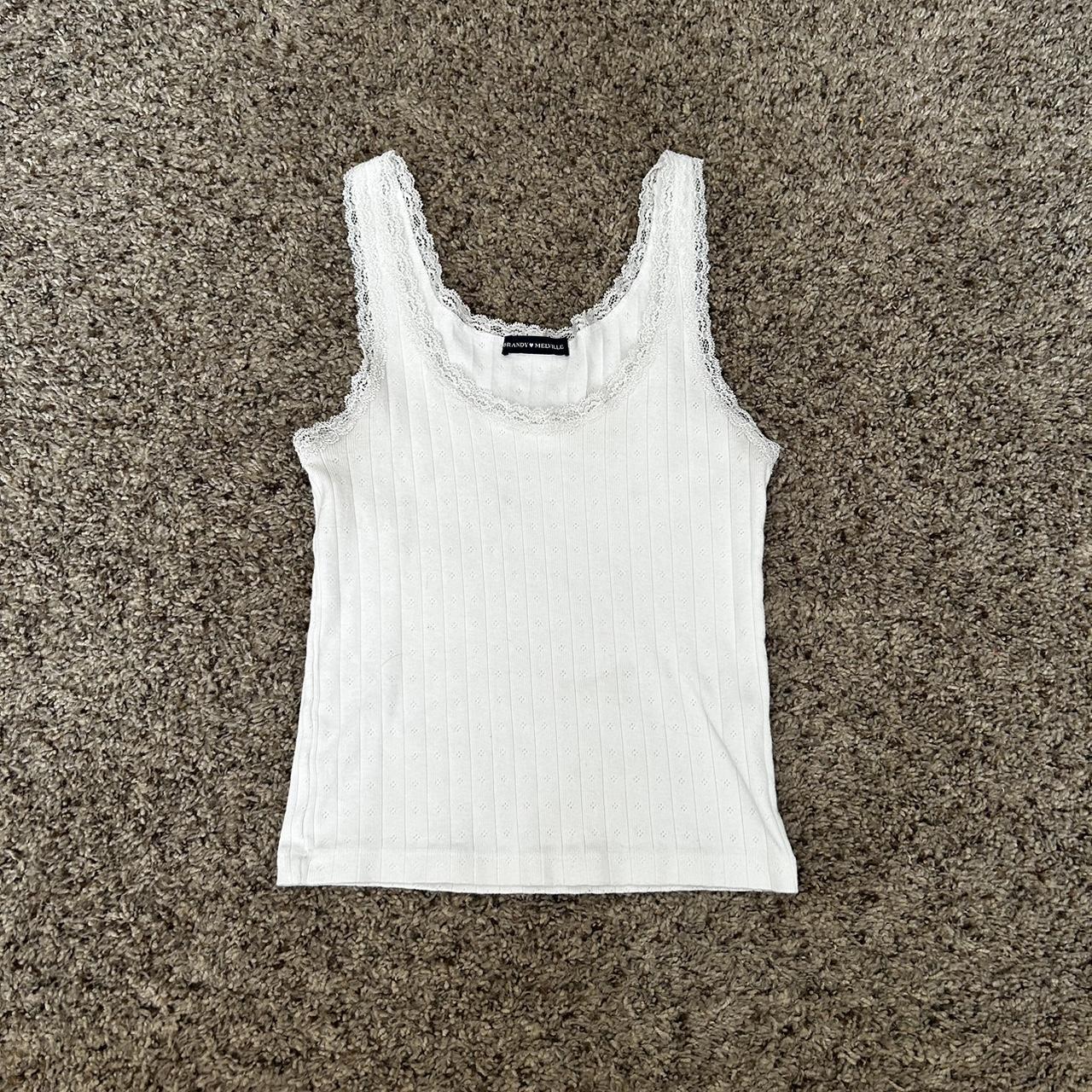 brandy melville white Ronnie tank super cute and... - Depop