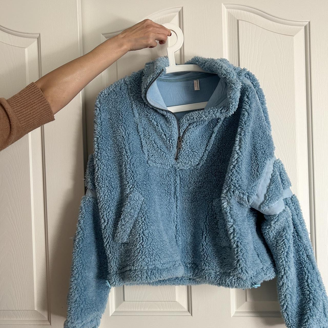Fluffy light blue half zip from Free People In... - Depop