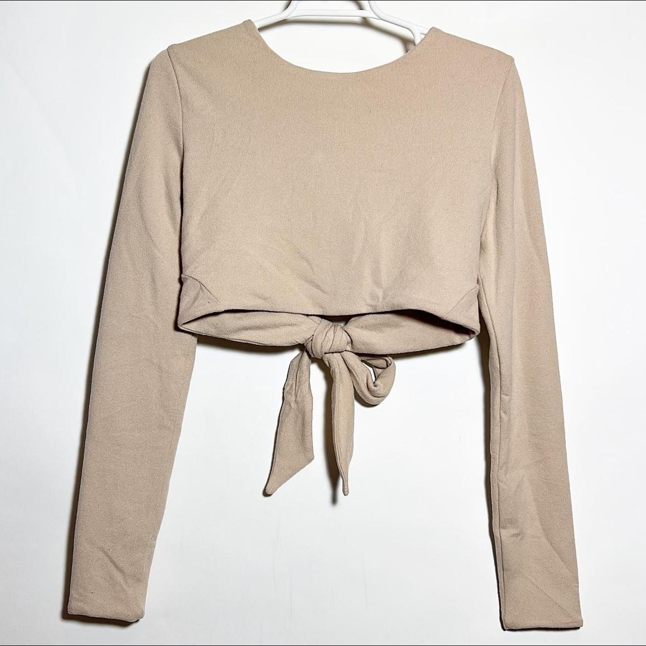 Cute tan crop top sweater. Size small. Has two thick... - Depop