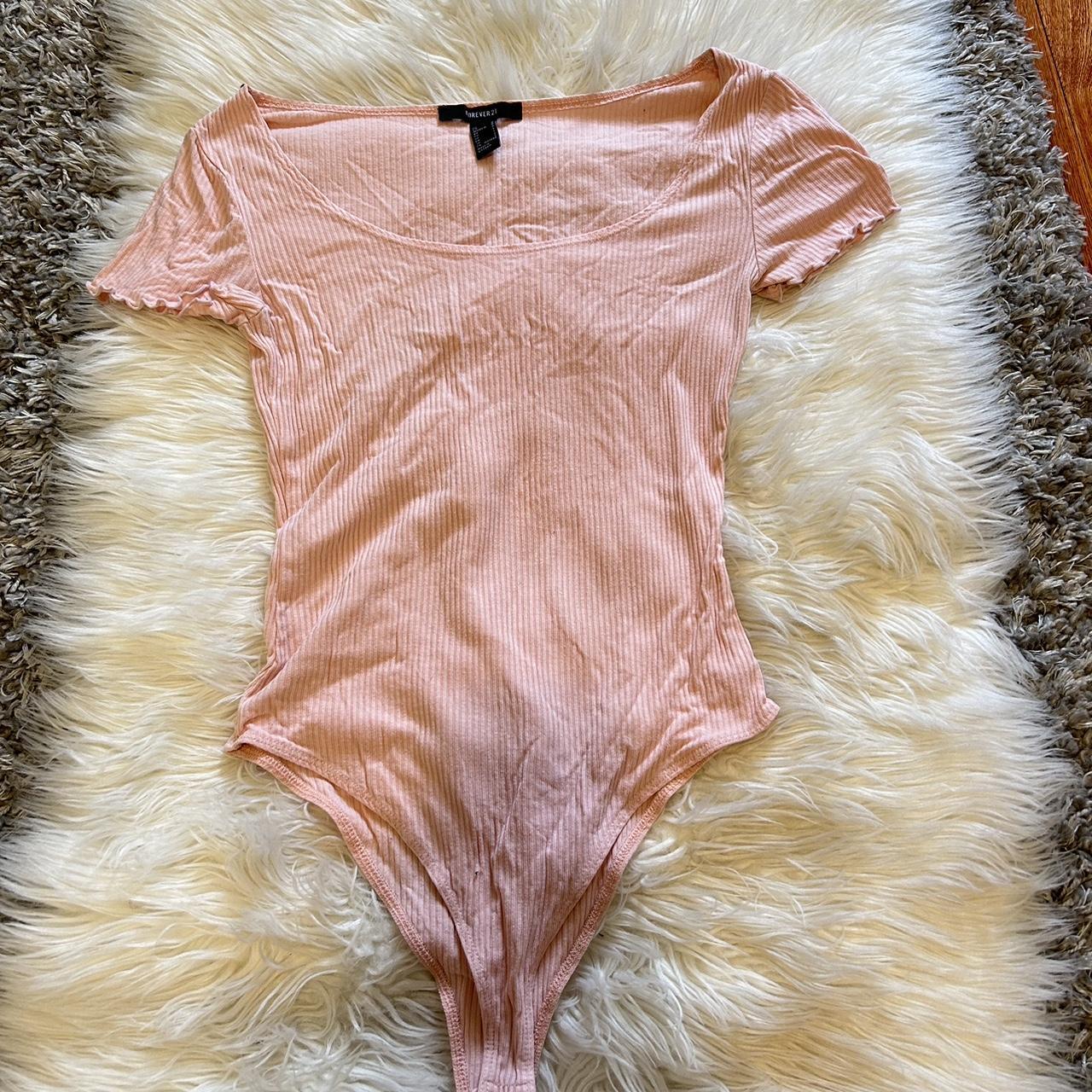 Light pink bodysuit Size:M fit S - Depop