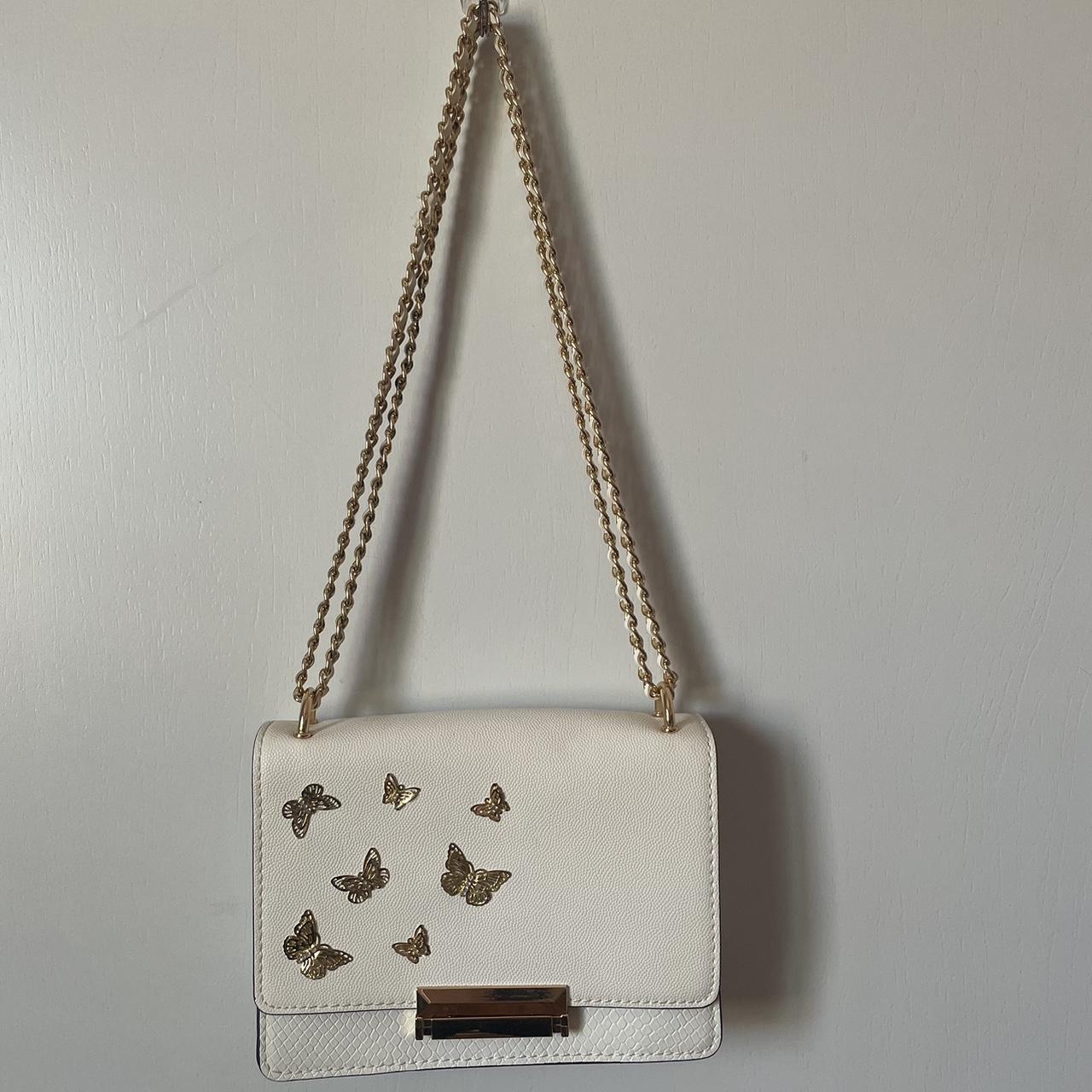 White butterfly cross body purse from aldo I used it... - Depop