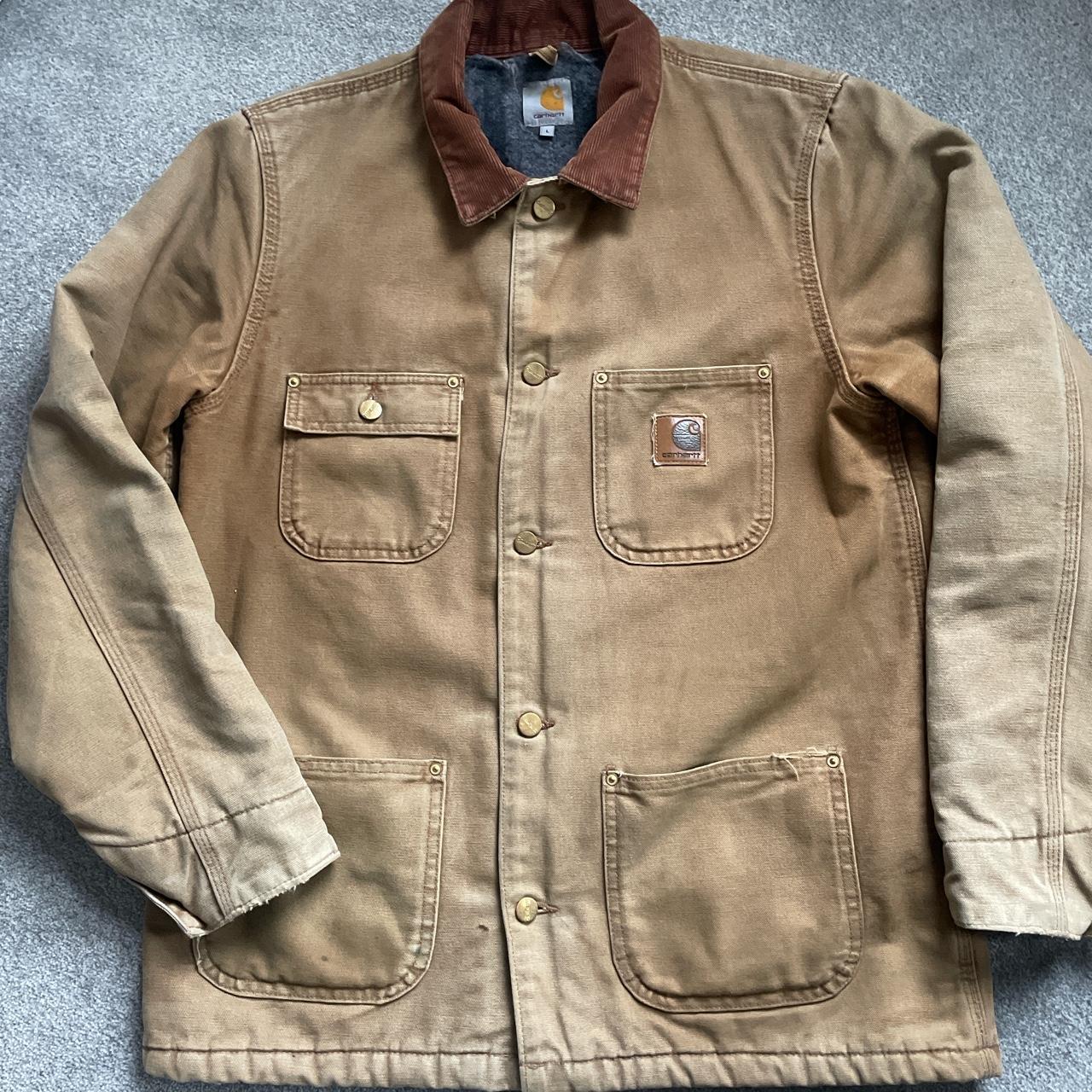 Carhartt chore coat / jacket . Faded with a few... - Depop