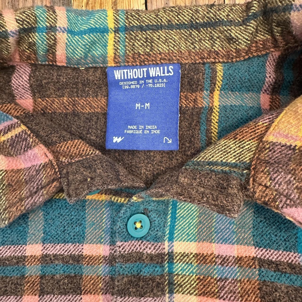 Brown and multi-coloured plaid flannel shirt with a... | Depop
