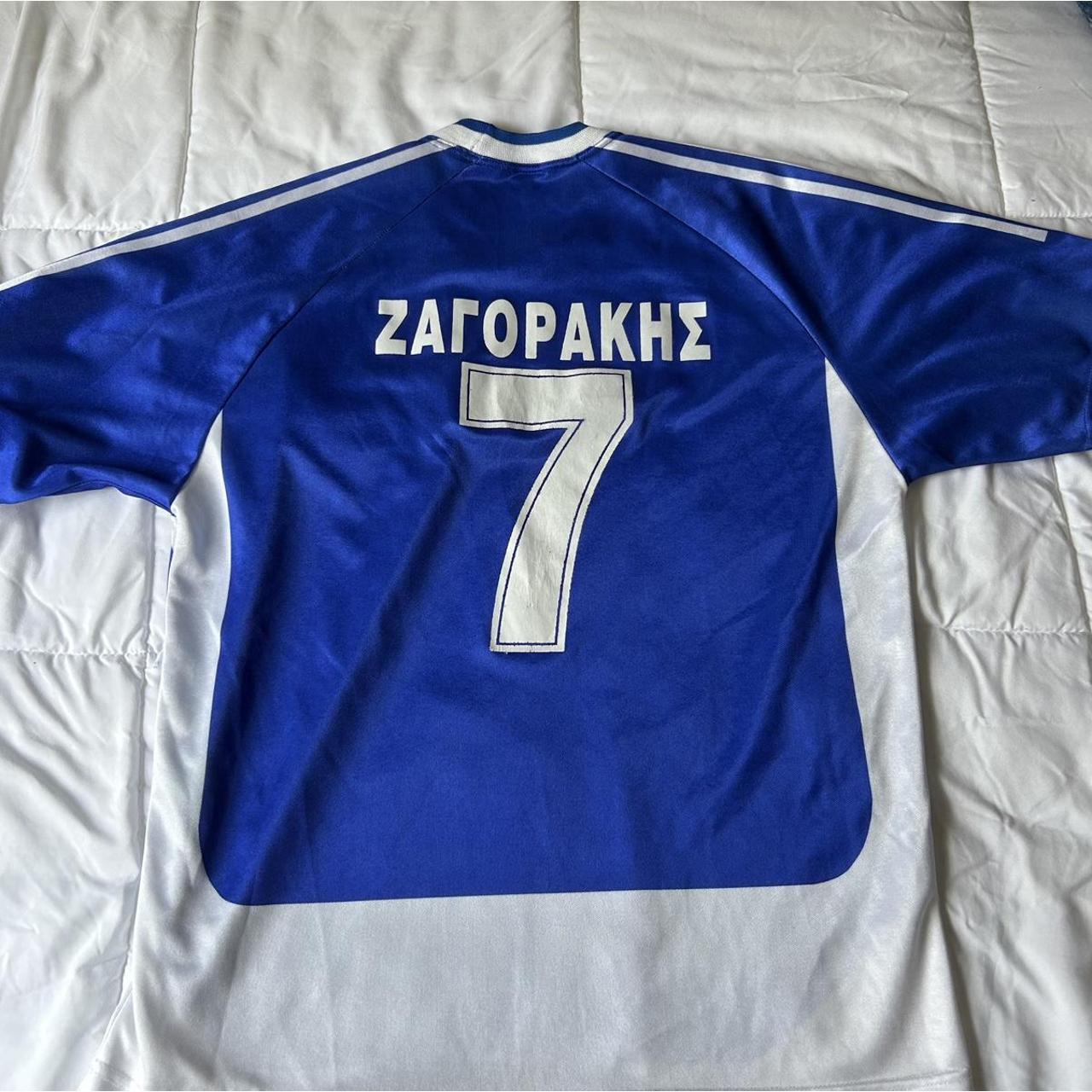 Vintage Greece Jersey #7 Size L but fits a little... - Depop