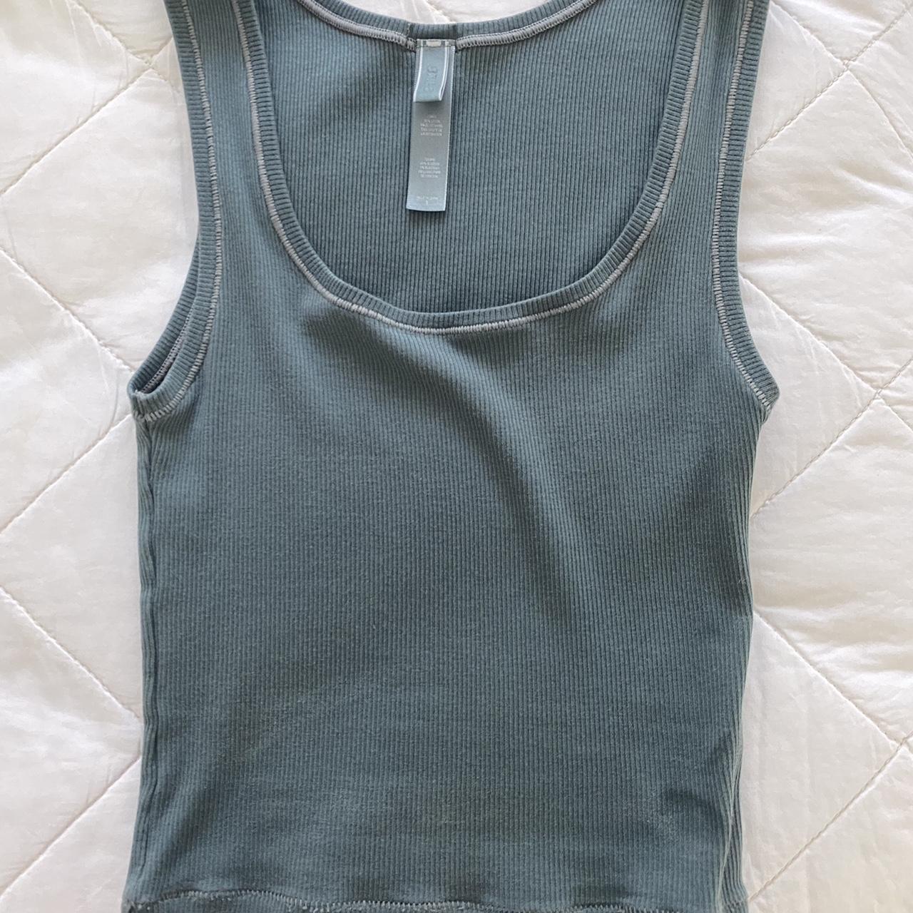 SKIMS cotton tank in the colour Kyanite Quite worn... - Depop