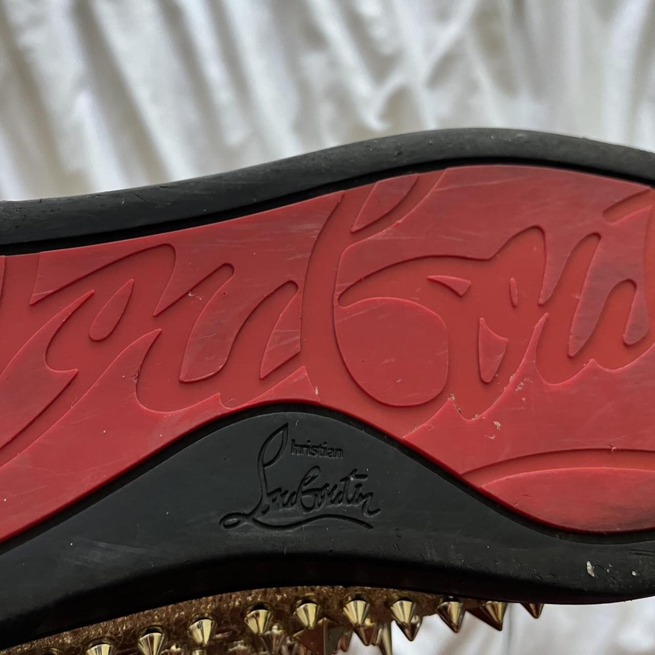 Christian Louboutin red bottom spike shoes. One side... - Depop