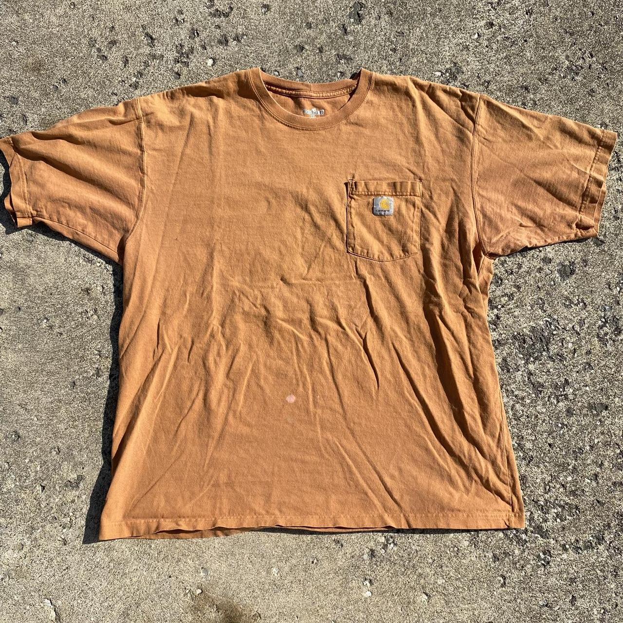 orange carhartt shirt small bleach stain on... - Depop