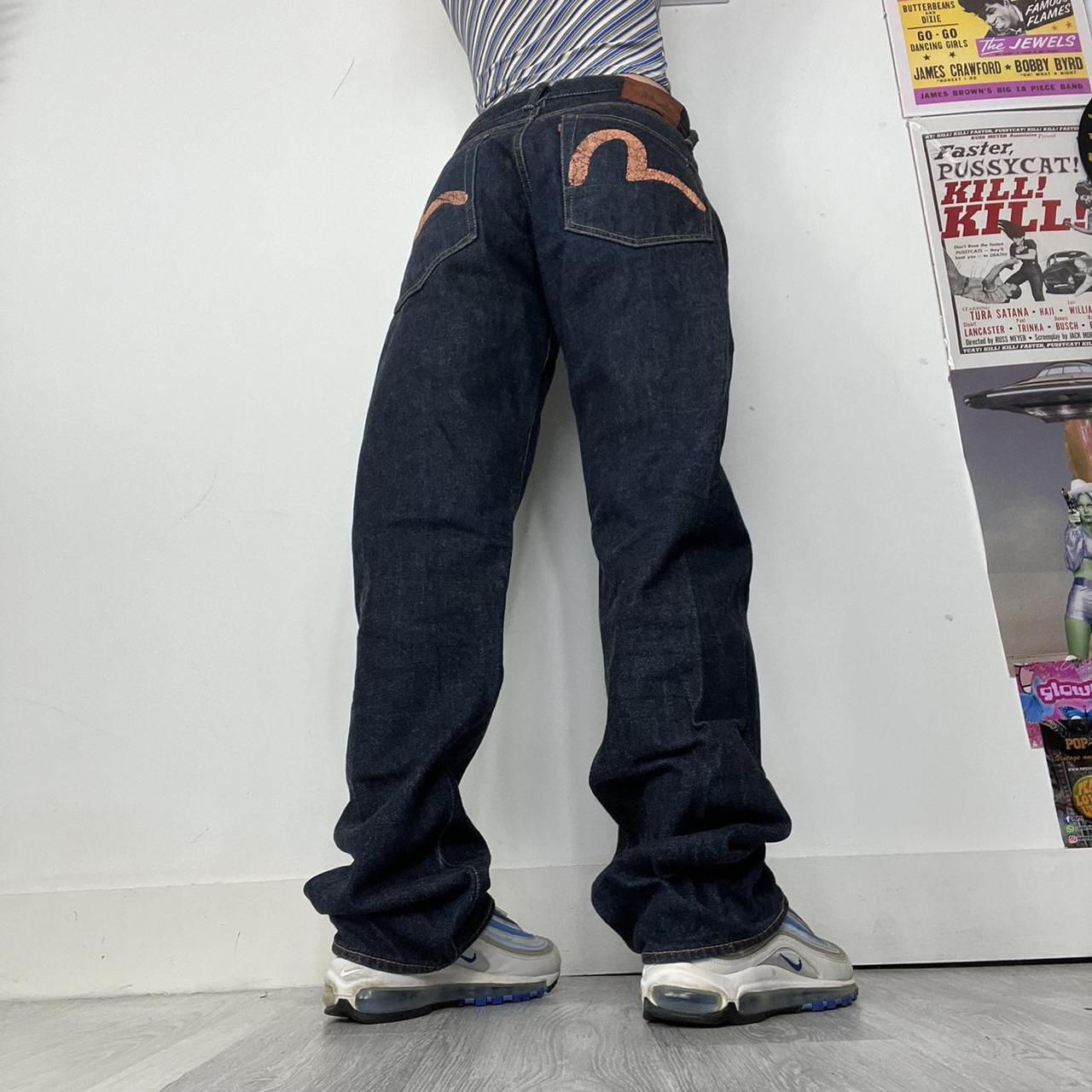 Amazing 00s 90s y2k baggy EVISU jeans with orange... - Depop